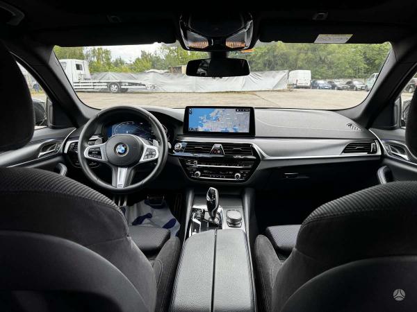 Grey BMW 520 2021 in Panevezys, with an engine capacity of 2.00 L and mileage of 159 thousand km for 24500 €, photo 6 on AUTOMOTO.COM.LV