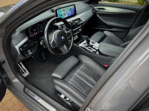 Grey BMW 520 2022 in Riga, with an engine capacity of 2.00 L and mileage of 182 thousand km for 24900 €, photo 13 on AUTOMOTO.COM.LV