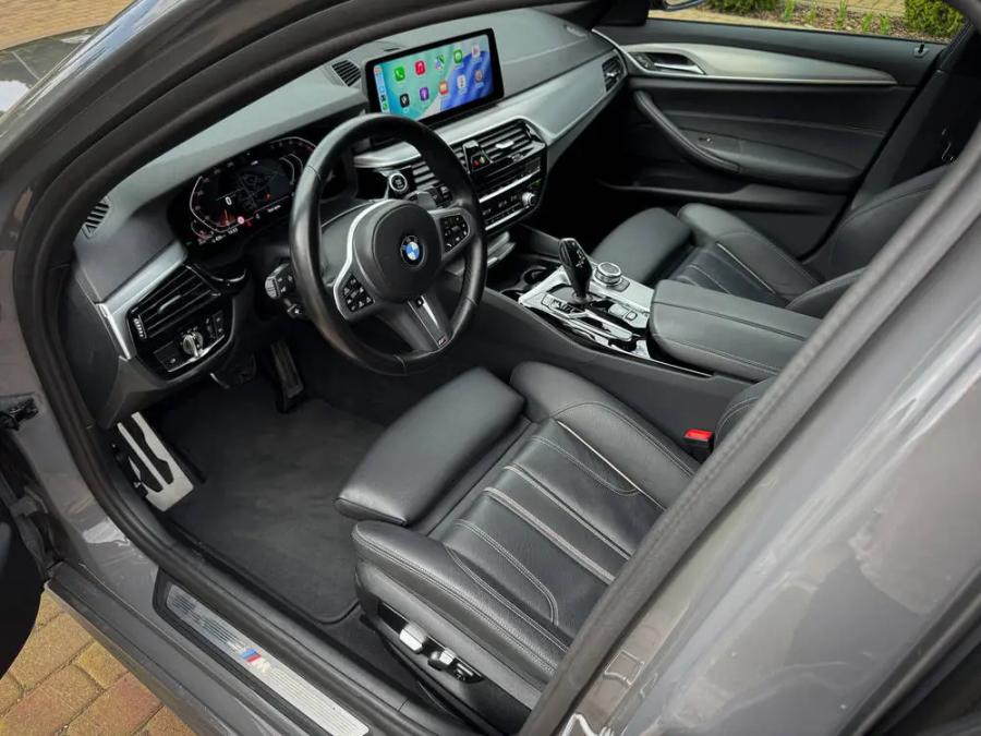 Grey BMW 520 2022 in Riga, with an engine capacity of 2.00 L and mileage of 182 thousand km for 24900 €, photo 13 on AUTOMOTO.COM.LV