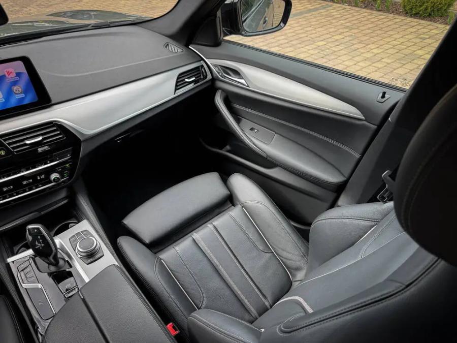 Grey BMW 520 2022 in Riga, with an engine capacity of 2.00 L and mileage of 182 thousand km for 24900 €, photo 26 on AUTOMOTO.COM.LV