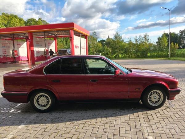 Red BMW 520 1995 in Riga, with an engine capacity of 2.00 L and mileage of 200 thousand km for 3900 €, photo 6 on AUTOMOTO.COM.LV