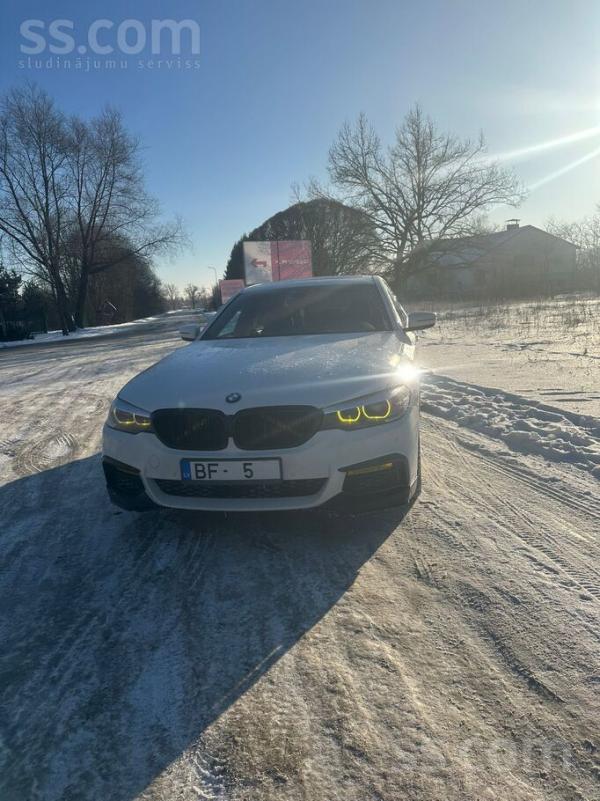 White BMW 520 2018 in Valmiera, with an engine capacity of 2.00 L and mileage of 248 thousand km for 19550 €, photo 6 on AUTOMOTO.COM.LV