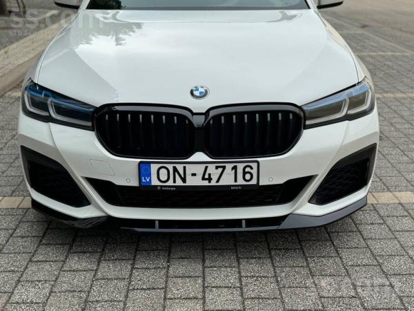 White BMW 520 2023 in Riga, with an engine capacity of 2.00 L and mileage of 165 thousand km for 33500 €, photo 7 on AUTOMOTO.COM.LV