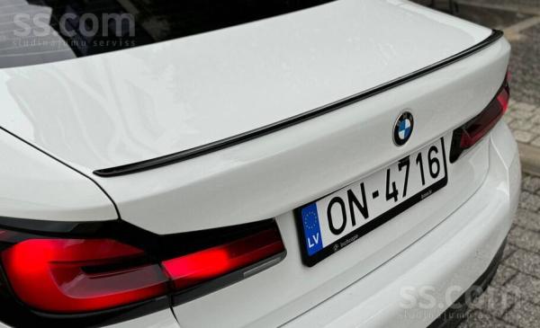 White BMW 520 2023 in Riga, with an engine capacity of 2.00 L and mileage of 165 thousand km for 33500 €, photo 8 on AUTOMOTO.COM.LV