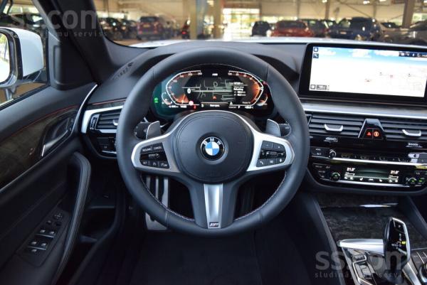 White BMW 520 2023 in Riga, with an engine capacity of 2.00 L and mileage of 168 thousand km for 33000 €, photo 7 on AUTOMOTO.COM.LV