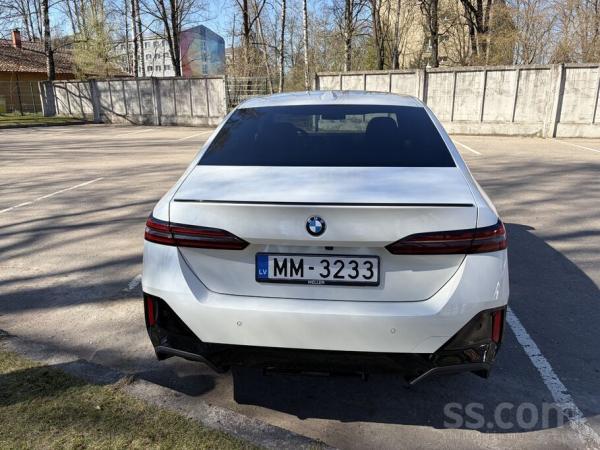 White BMW 520 2023 in Riga, with an engine capacity of 2.00 L and mileage of 61 thousand km for 49500 €, photo 9 on AUTOMOTO.COM.LV