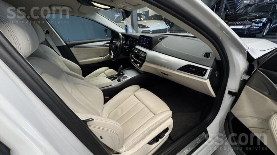 White BMW 520 2017 in Riga, with an engine capacity of 2.00 L and mileage of 167 thousand km for 15990 €, photo 11 on AUTOMOTO.COM.LV