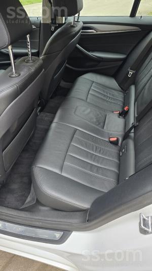 White BMW 520 2018 in Riga, with an engine capacity of 2.00 L and mileage of 295 thousand km for 15850 €, photo 6 on AUTOMOTO.COM.LV