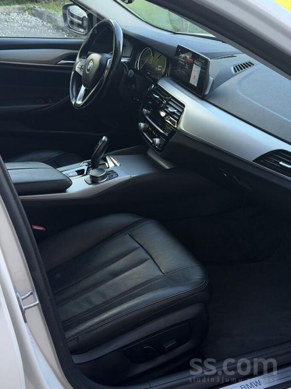 White BMW 520 2018 in Riga, with an engine capacity of 2.00 L and mileage of 278 thousand km for 14980 €, photo 8 on AUTOMOTO.COM.LV