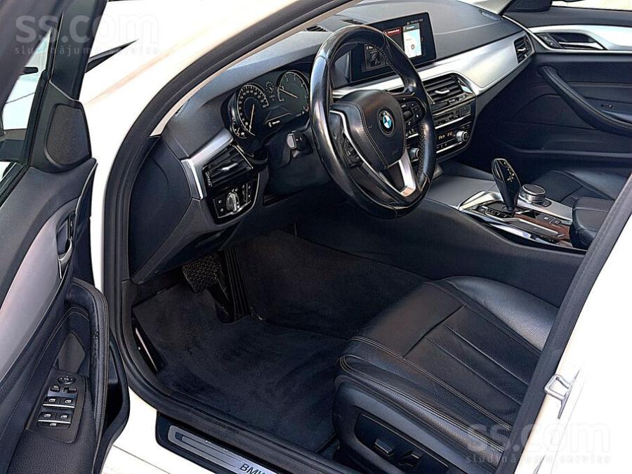 White BMW 520 2018 in Riga, with an engine capacity of 2.00 L and mileage of 278 thousand km for 14980 €, photo 8 on AUTOMOTO.COM.LV