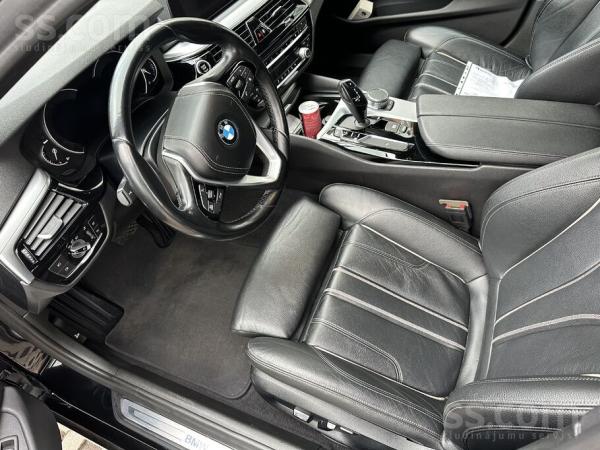 Black BMW 525 2018 in Riga, with an engine capacity of 2.00 L and mileage of 258 thousand km for 15850 €, photo 8 on AUTOMOTO.COM.LV