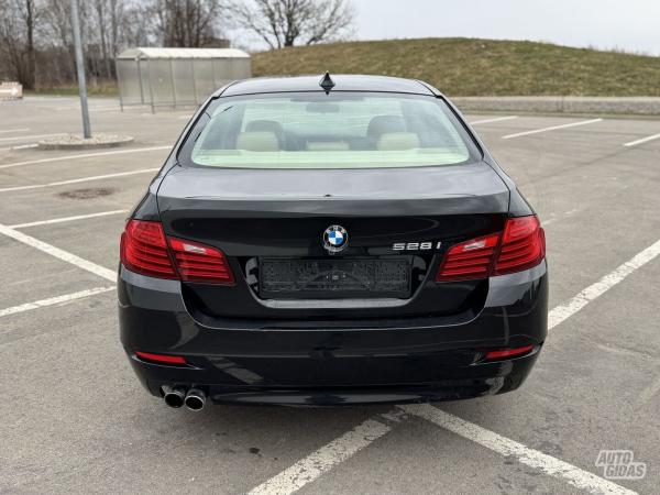 Black BMW 528 2014 in Radviliskis, with an engine capacity of 2.00 L and mileage of 173 thousand km for 6700 €, photo 5 on AUTOMOTO.COM.LV
