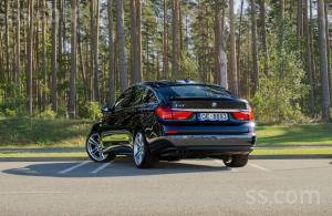 Black BMW 530 2013 in Riga, with an engine capacity of 3.00 L and mileage of 234 thousand km for 12590 €, photo 7 on AUTOMOTO.COM.LV