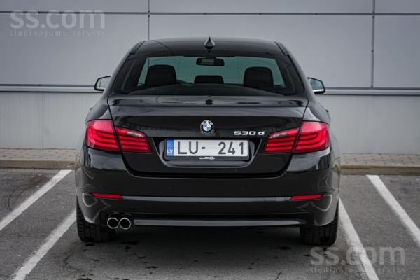 Black BMW 530 2010 in Riga, with an engine capacity of 3.00 L and mileage of 0 thousand km for 9950 €, photo 5 on AUTOMOTO.COM.LV