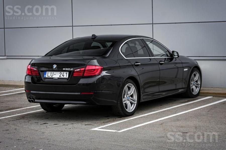Black BMW 530 2010 in Riga, with an engine capacity of 3.00 L and mileage of 303 thousand km for 7990 €, photo 5 on AUTOMOTO.COM.LV