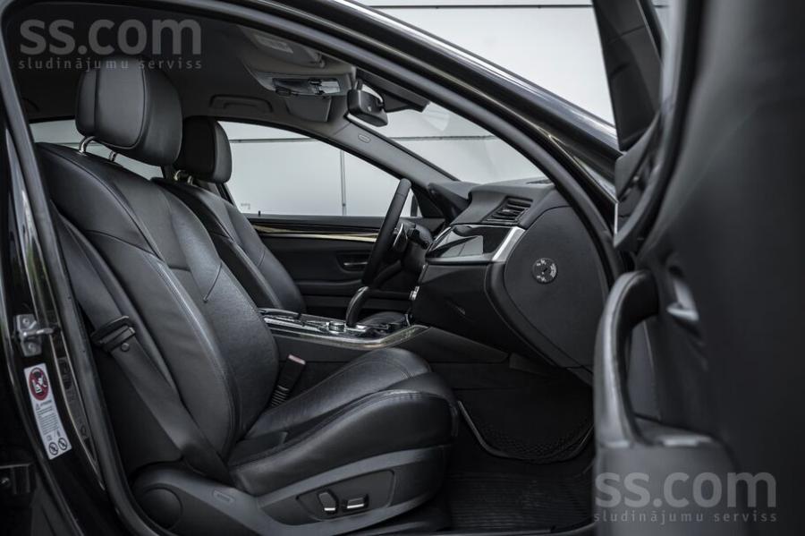 Black BMW 530 2010 in Riga, with an engine capacity of 3.00 L and mileage of 303 thousand km for 7990 €, photo 10 on AUTOMOTO.COM.LV