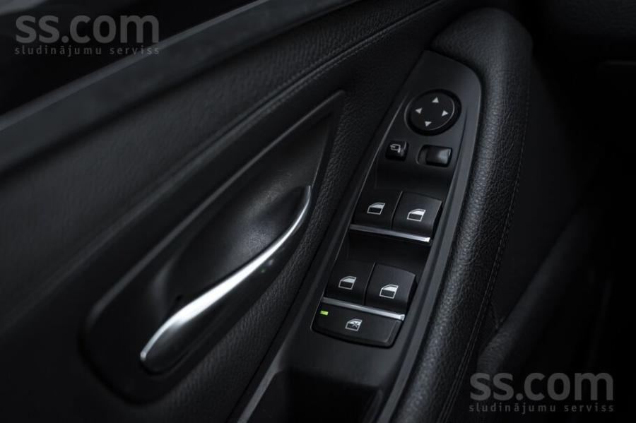 Black BMW 530 2010 in Riga, with an engine capacity of 3.00 L and mileage of 303 thousand km for 7990 €, photo 15 on AUTOMOTO.COM.LV