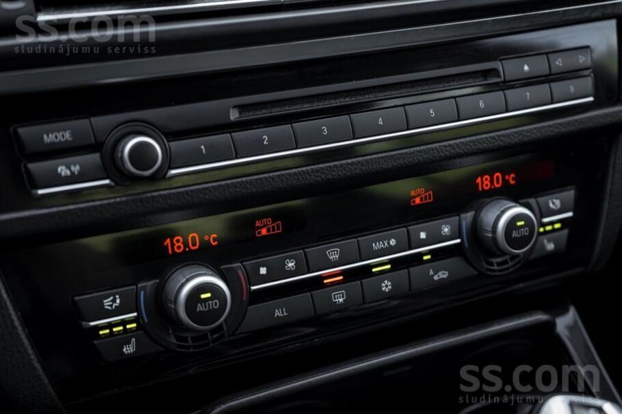 Black BMW 530 2010 in Riga, with an engine capacity of 3.00 L and mileage of 303 thousand km for 7990 €, photo 25 on AUTOMOTO.COM.LV