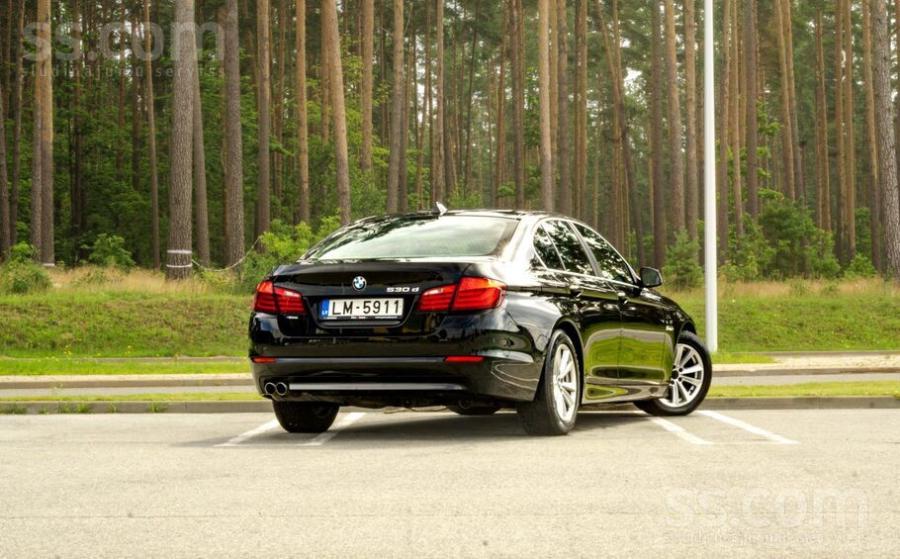 Black BMW 530 2012 in Riga, with an engine capacity of 3.00 L and mileage of 294 thousand km for 8590 €, photo 6 on AUTOMOTO.COM.LV