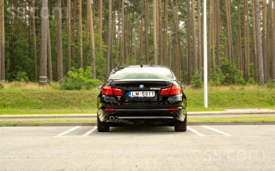 Black BMW 530 2012 in Riga, with an engine capacity of 3.00 L and mileage of 294 thousand km for 8590 €, photo 7 on AUTOMOTO.COM.LV