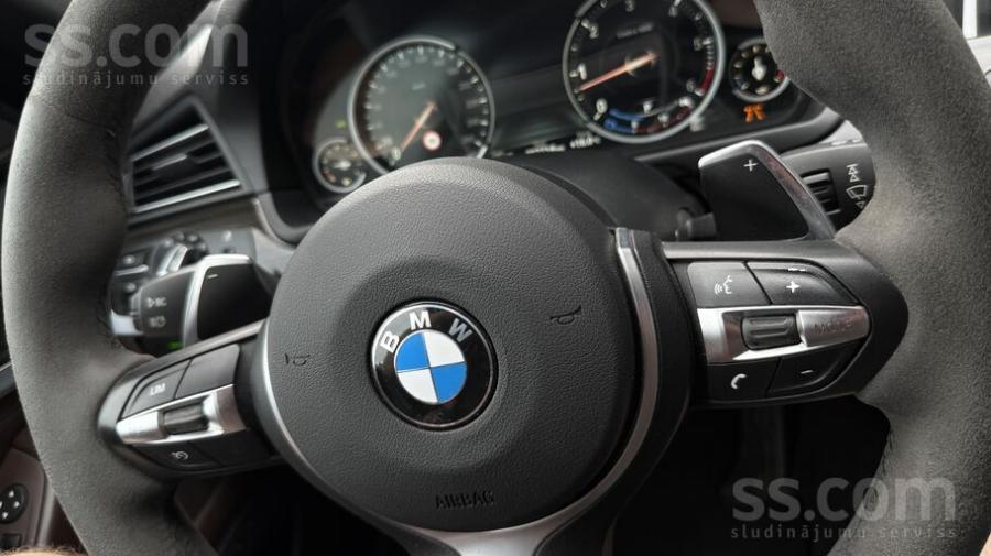 Black BMW 530 2014 in Riga, with an engine capacity of 3.00 L and mileage of 228 thousand km for 13900 €, photo 21 on AUTOMOTO.COM.LV