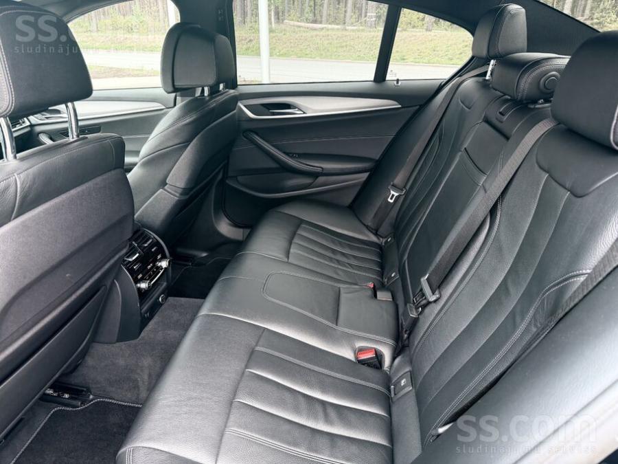 Black BMW 530 2017 in Riga, with an engine capacity of 3.00 L and mileage of 190 thousand km for 24900 €, photo 10 on AUTOMOTO.COM.LV