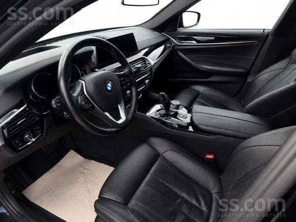 Black BMW 530 2017 in Riga, with an engine capacity of 2.00 L and mileage of 225 thousand km for 15990 €, photo 8 on AUTOMOTO.COM.LV