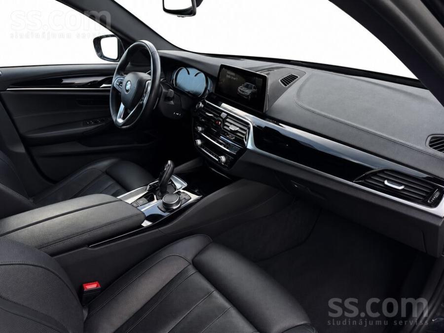 Black BMW 530 2017 in Riga, with an engine capacity of 2.00 L and mileage of 225 thousand km for 15990 €, photo 10 on AUTOMOTO.COM.LV