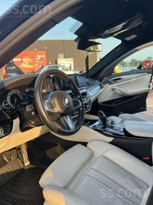 Black BMW 530 2017 in Riga, with an engine capacity of 3.00 L and mileage of 144 thousand km for 23800 €, photo 11 on AUTOMOTO.COM.LV