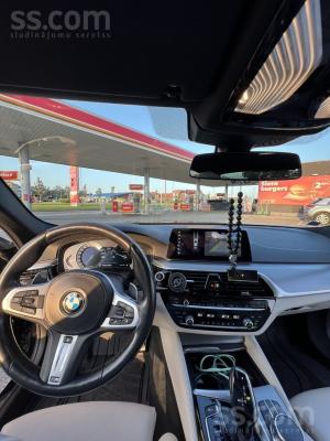 Black BMW 530 2017 in Riga, with an engine capacity of 3.00 L and mileage of 144 thousand km for 23800 €, photo 12 on AUTOMOTO.COM.LV