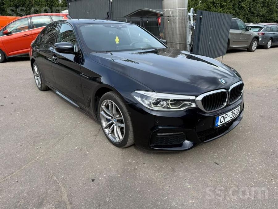 Black BMW 530 2017 in Riga, with an engine capacity of 3.00 L and mileage of 169 thousand km for 24990 €, photo 3 on AUTOMOTO.COM.LV