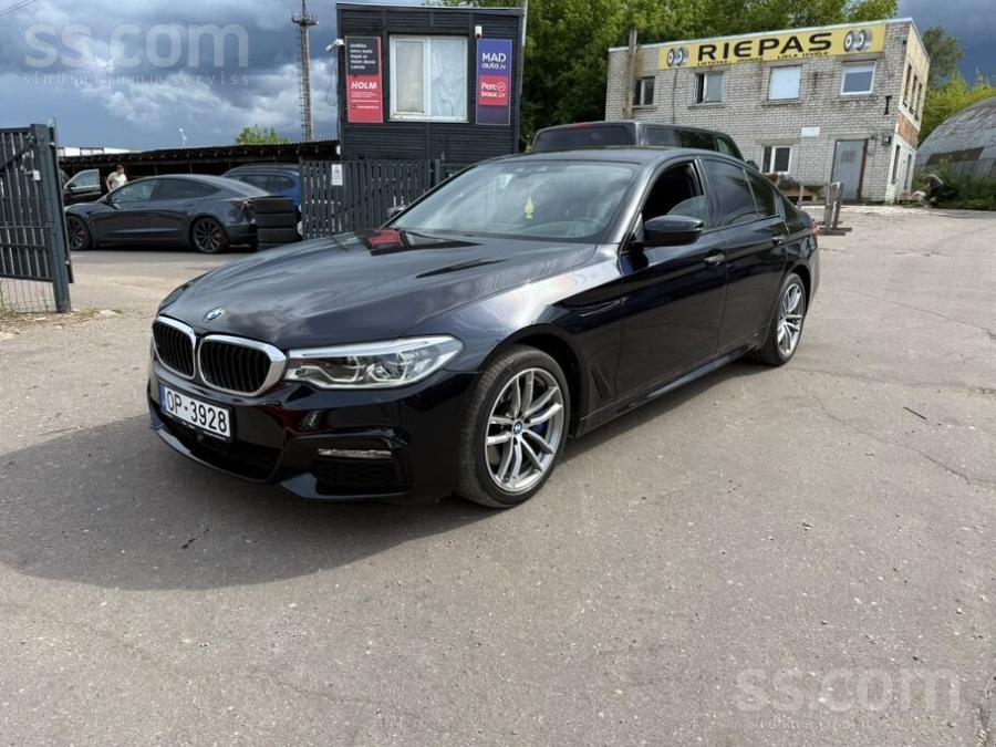 Black BMW 530 2017 in Riga, with an engine capacity of 3.00 L and mileage of 169 thousand km for 24990 €, photo 4 on AUTOMOTO.COM.LV