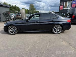 Black BMW 530 2017 in Riga, with an engine capacity of 3.00 L and mileage of 169 thousand km for 24990 €, photo 5 on AUTOMOTO.COM.LV