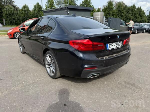 Black BMW 530 2017 in Riga, with an engine capacity of 3.00 L and mileage of 169 thousand km for 24990 €, photo 6 on AUTOMOTO.COM.LV