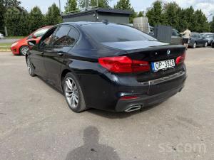 Black BMW 530 2017 in Riga, with an engine capacity of 3.00 L and mileage of 169 thousand km for 24990 €, photo 7 on AUTOMOTO.COM.LV