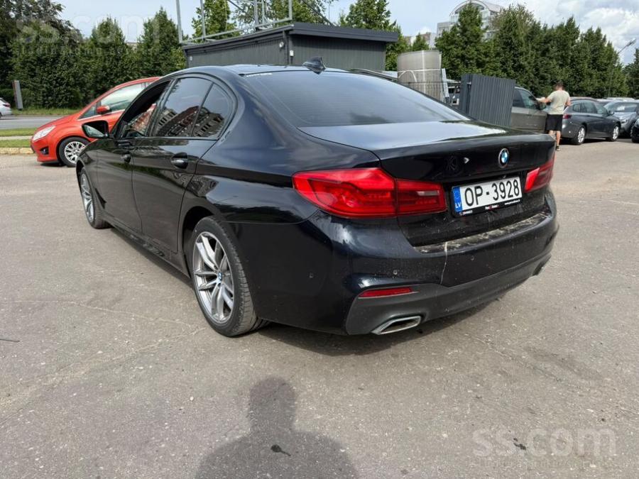 Black BMW 530 2017 in Riga, with an engine capacity of 3.00 L and mileage of 169 thousand km for 24990 €, photo 7 on AUTOMOTO.COM.LV