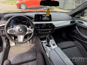 Black BMW 530 2017 in Riga, with an engine capacity of 3.00 L and mileage of 169 thousand km for 24990 €, photo 9 on AUTOMOTO.COM.LV