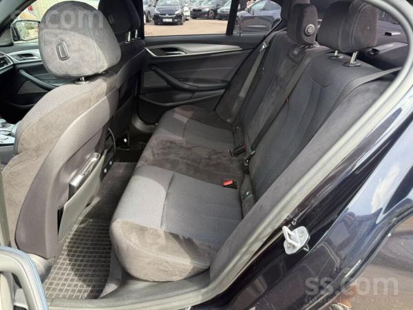 Black BMW 530 2017 in Riga, with an engine capacity of 3.00 L and mileage of 169 thousand km for 24990 €, photo 10 on AUTOMOTO.COM.LV