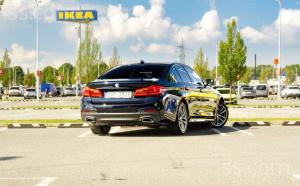 Black BMW 530 2017 in Riga, with an engine capacity of 3.00 L and mileage of 169 thousand km for 24990 €, photo 7 on AUTOMOTO.COM.LV