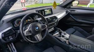 Black BMW 530 2017 in Riga, with an engine capacity of 3.00 L and mileage of 169 thousand km for 24990 €, photo 11 on AUTOMOTO.COM.LV