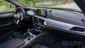 Black BMW 530 2017 in Riga, with an engine capacity of 3.00 L and mileage of 169 thousand km for 24990 €, photo 12 on AUTOMOTO.COM.LV