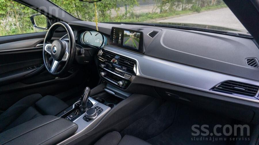 Black BMW 530 2017 in Riga, with an engine capacity of 3.00 L and mileage of 169 thousand km for 24990 €, photo 12 on AUTOMOTO.COM.LV
