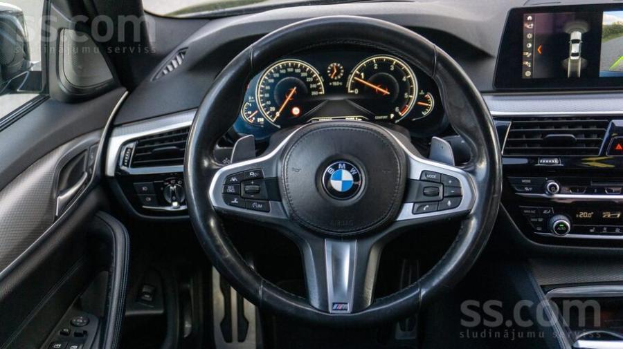 Black BMW 530 2017 in Riga, with an engine capacity of 3.00 L and mileage of 169 thousand km for 24990 €, photo 15 on AUTOMOTO.COM.LV