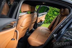 Black BMW 530 2017 in Riga, with an engine capacity of 3.00 L and mileage of 233 thousand km for 23900 €, photo 8 on AUTOMOTO.COM.LV