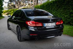 Black BMW 530 2017 in Riga, with an engine capacity of 3.00 L and mileage of 233 thousand km for 23900 €, photo 12 on AUTOMOTO.COM.LV
