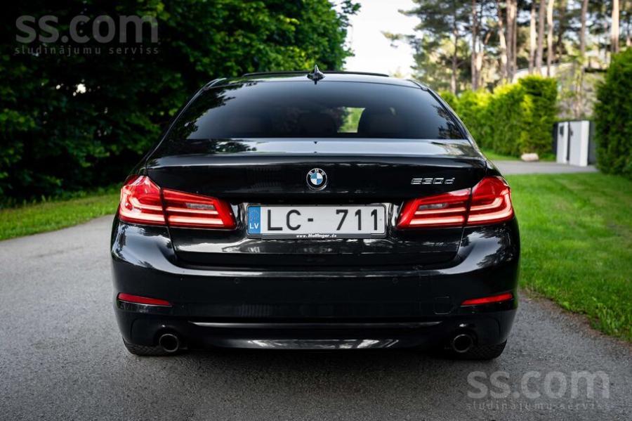 Black BMW 530 2017 in Riga, with an engine capacity of 3.00 L and mileage of 233 thousand km for 23900 €, photo 13 on AUTOMOTO.COM.LV