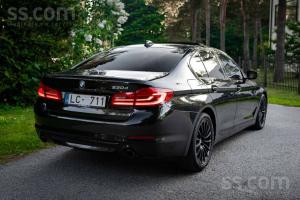 Black BMW 530 2017 in Riga, with an engine capacity of 3.00 L and mileage of 233 thousand km for 23900 €, photo 19 on AUTOMOTO.COM.LV