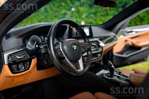 Black BMW 530 2017 in Riga, with an engine capacity of 3.00 L and mileage of 233 thousand km for 23900 €, photo 27 on AUTOMOTO.COM.LV
