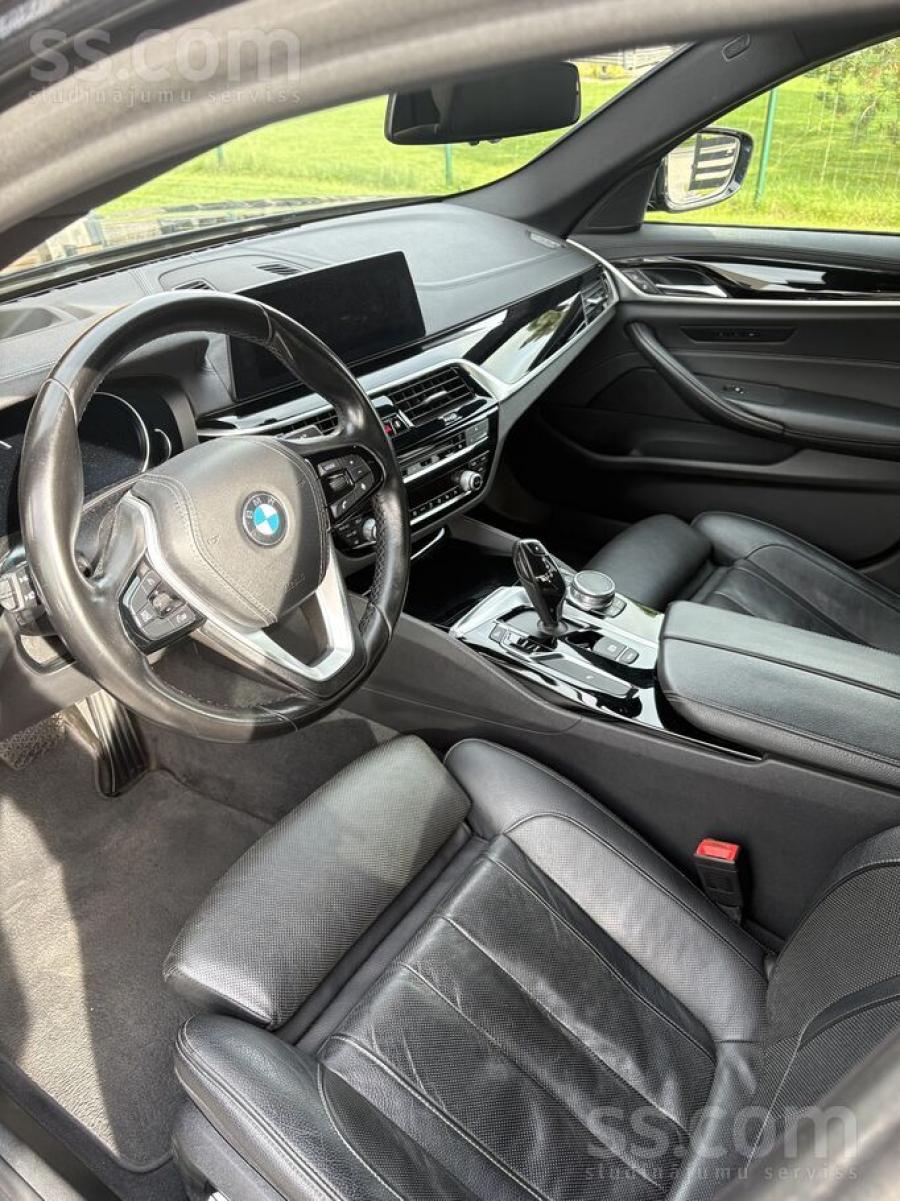 Black BMW 530 2017 in Riga, with an engine capacity of 2.00 L and mileage of 209 thousand km for 19200 €, photo 7 on AUTOMOTO.COM.LV