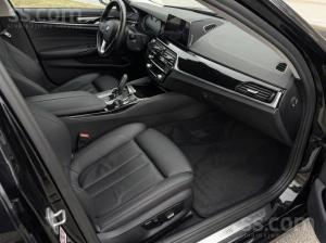 Black BMW 530 2018 in Riga, with an engine capacity of 3.00 L and mileage of 165 thousand km for 21490 €, photo 12 on AUTOMOTO.COM.LV